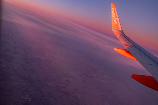 View Easyjet Wing Sunrise During Flight Editorial Stock Photo - Stock ...