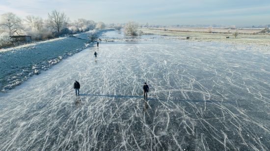 People Skating On Frozen Fen Near Editorial Stock Photo - Stock Image ...