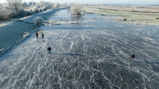 People Skating On Frozen Fen Near Editorial Stock Photo - Stock Image ...