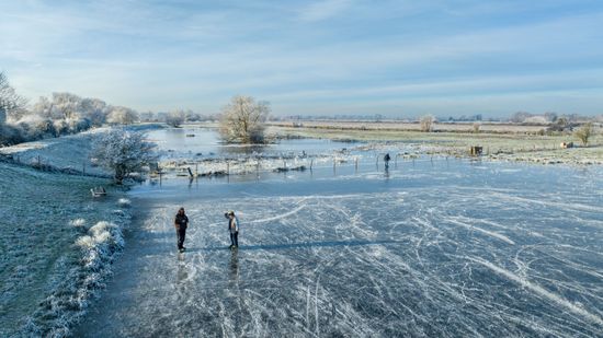 People Skating On Frozen Fen Near Editorial Stock Photo - Stock Image ...