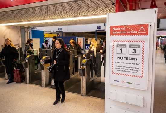 Passengers Walk Past Information Signs On Editorial Stock Photo - Stock ...