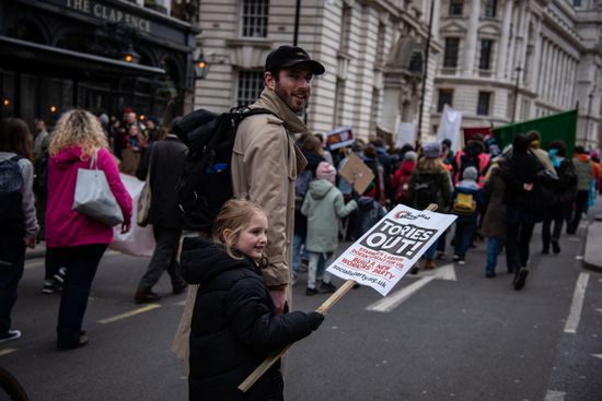 Young Activist Holds Placard During Public Editorial Stock Photo ...