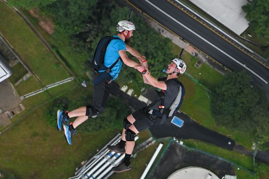 Base Jumpers Hold Hands They Leap Editorial Stock Photo - Stock Image ...