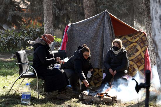 People Rest By Their Temporary Shelter Editorial Stock Photo - Stock ...