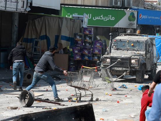 Palestinians Throw Stones Israeli Army Vehicles Editorial Stock Photo ...