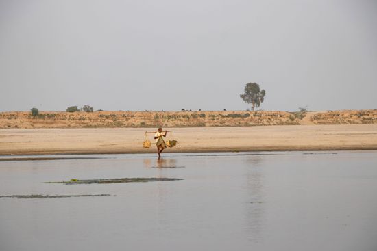 Passengers Walk Across Dry Riverbed On Editorial Stock Photo - Stock ...