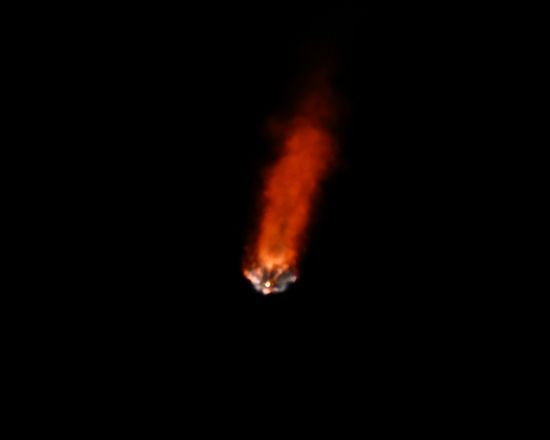 Spacex Falcon 9 Rocket Passes Through Editorial Stock Photo - Stock ...