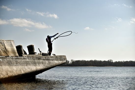Man Throws Mooring Line Off Barge Editorial Stock Photo - Stock Image ...