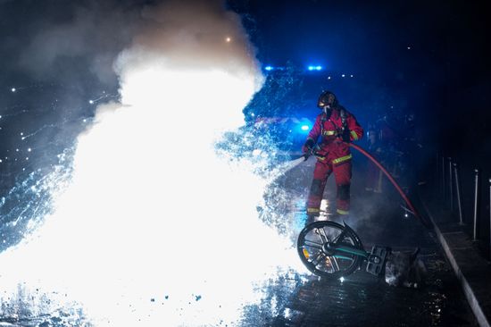 Firefighter Extinguishes Remains Barricade Formed Burning Editorial ...