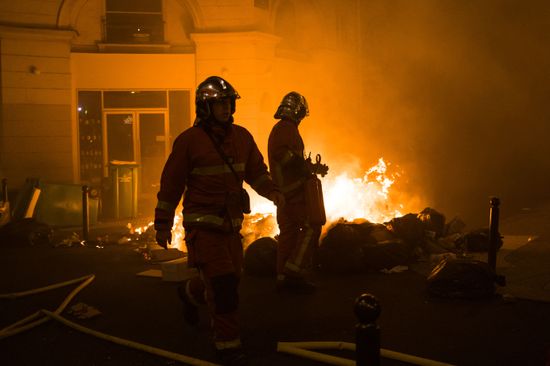 Firefighter Tries Extinguish Bags Garbage On Editorial Stock Photo ...