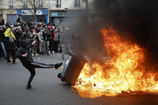 Protester Pushes Garbage Bin Into Fire Editorial Stock Photo - Stock ...