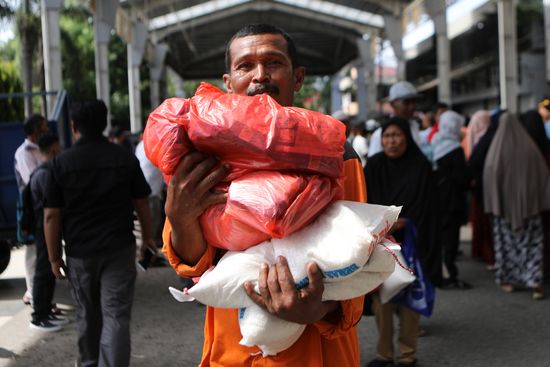 Man Holds Basic Food Packages Distributed Editorial Stock Photo - Stock ...