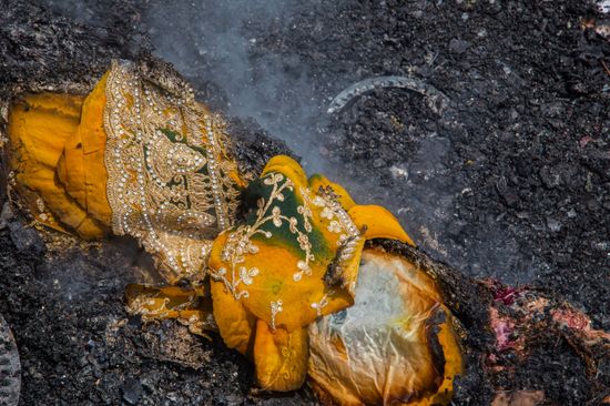 New Burnt Garment Seen On Ground Editorial Stock Photo - Stock Image ...