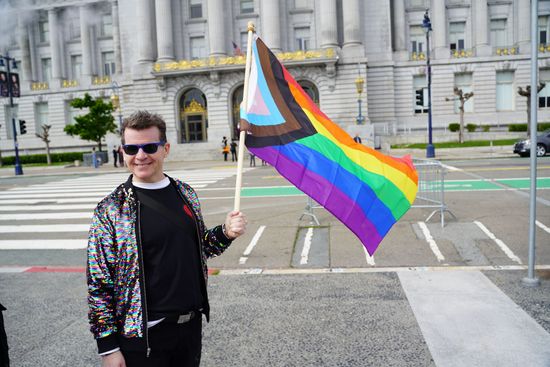 Protester Holds Rainbow Flag During March Editorial Stock Photo - Stock ...