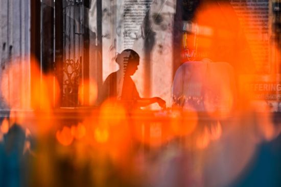 Christian Devotee Reflected On Glass Lights Editorial Stock Photo ...