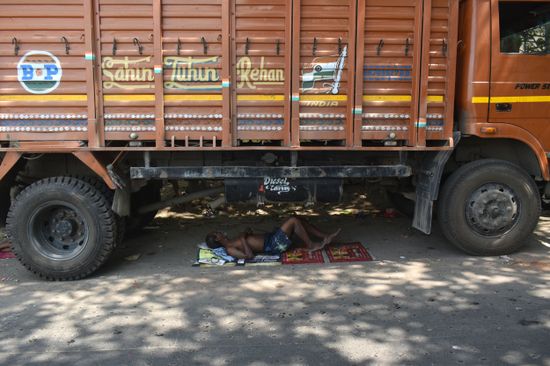 Person Sleeping Under Truck On Hot Editorial Stock Photo - Stock Image ...