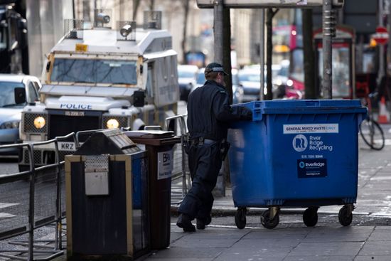 Police Officer Moves Bins Away Roads Editorial Stock Photo - Stock ...