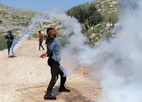 Palestinian Protester Uses Slingshot Hurl Back Editorial Stock Photo ...