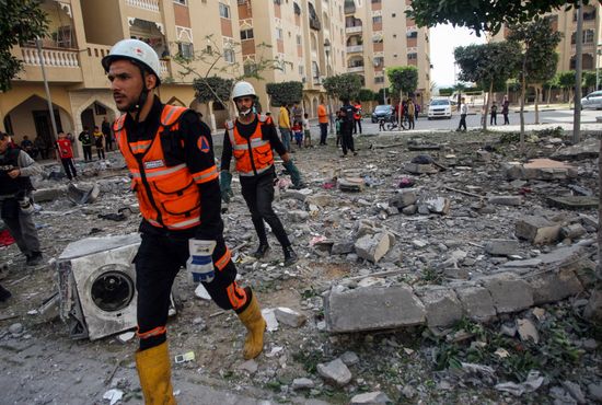 Civil Defence Workers Walks Past Building Editorial Stock Photo - Stock ...