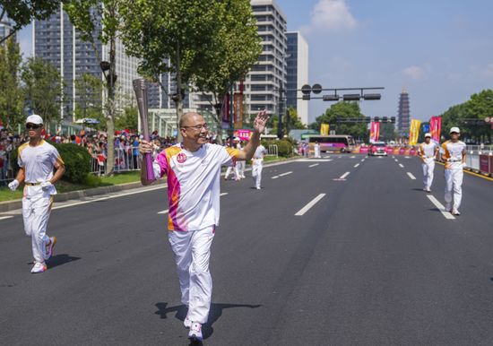 Torch Bearer Yang Weiming Runs Torch Editorial Stock Photo - Stock Image | Shutterstock