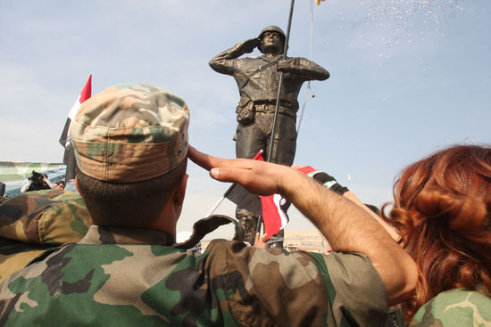 Syrian Regime Supporters Salute Syrian Soldier Editorial Stock Photo ...