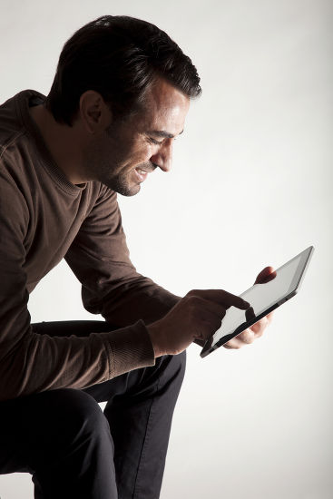 Model Released Smiling Man Using Ipad Editorial Stock Photo - Stock ...