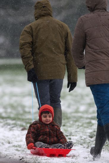 Child Being Pulled On Sledge Editorial Stock Photo - Stock Image ...