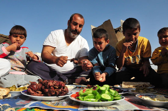 Muslims Eating Lamb During Eid Aladha Editorial Stock Photo - Stock ...