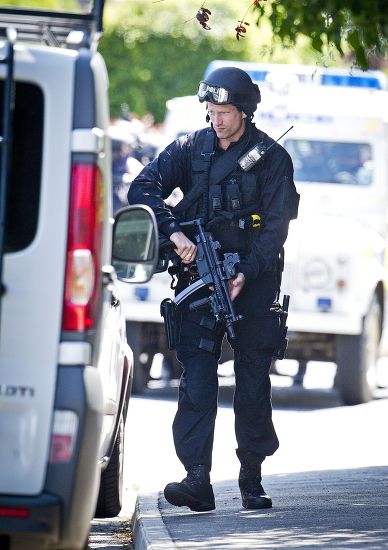 Armed Police Enter Property On Morton Editorial Stock Photo - Stock ...