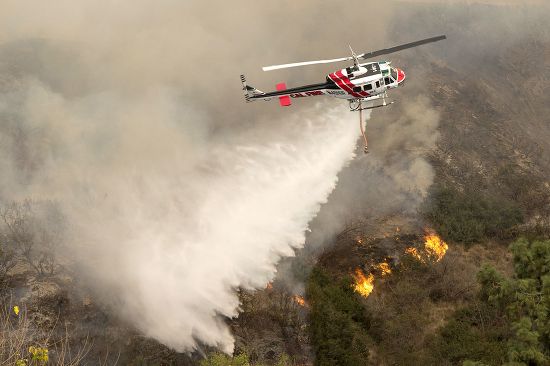 Helicopter Sprays Water During Operation Editorial Stock Photo - Stock ...