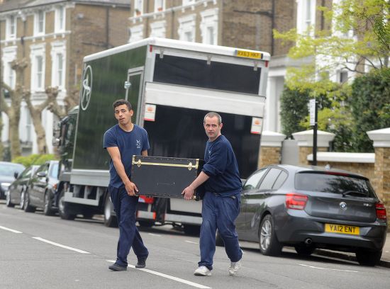 Removal Men Taking Away Possessions Editorial Stock Photo - Stock Image ...