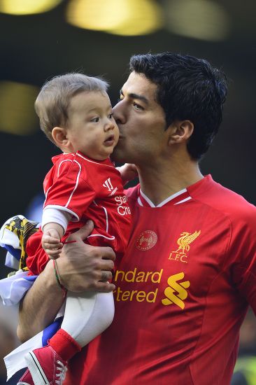 Liverpools Luis Suarez Kisses His Baby Editorial Stock Photo - Stock ...