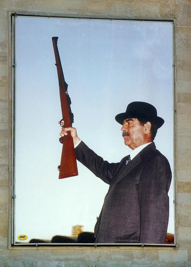 Poster Saddam Hussein Holding Gun Editorial Stock Photo - Stock Image ...