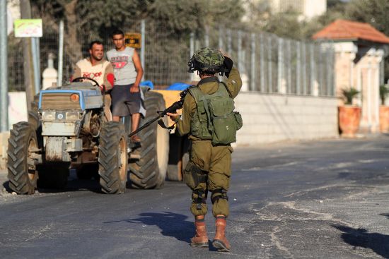 Palestinians Ride Tractor Past Israeli Soldier Editorial Stock Photo ...