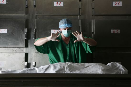 Pathologist Stands Over Corpse Mortuary Editorial Stock Photo - Stock ...