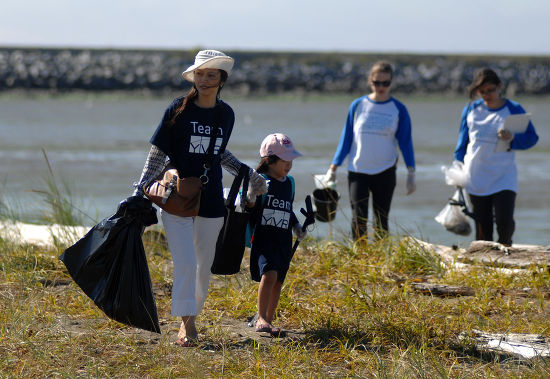Volunteers Clean Beach Surrounding Area During Editorial Stock Photo ...