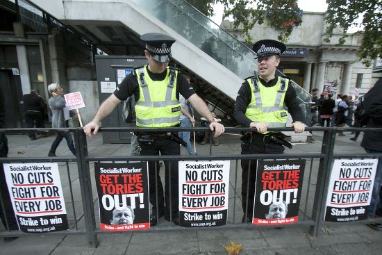 Police Officers Stand Behind Protest Placards Editorial Stock Photo ...