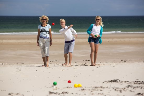 Family Playing Boules On Bamburgh Beach Editorial Stock Photo - Stock ...
