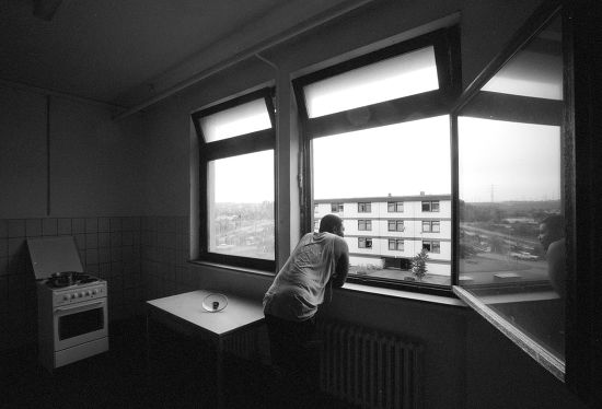 Asylum Seeker Standing By Window Asylum Editorial Stock Photo - Stock ...