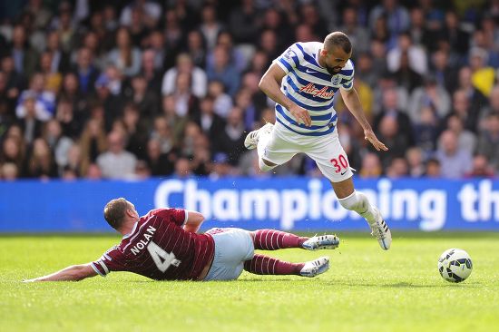 Sandro Qpr Leaps Over Tackle By Editorial Stock Photo - Stock Image ...