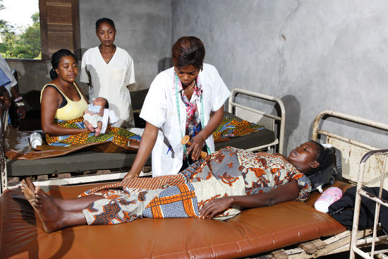 Pregnant Woman Being Examined By Doctor Editorial Stock Photo - Stock ...