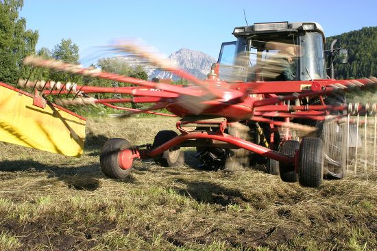 Red Tractor Rotating Hay Rake Motion Editorial Stock Photo - Stock ...
