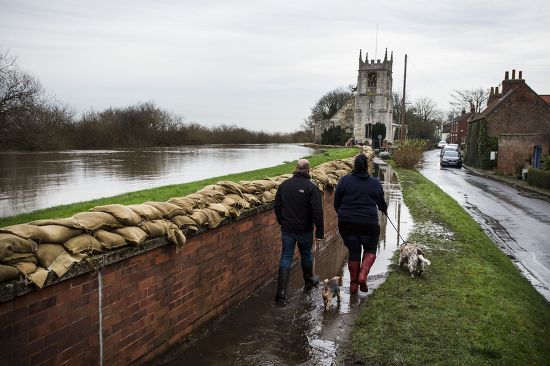 Couple Walk Their Dog Past Sandbags Editorial Stock Photo - Stock Image ...