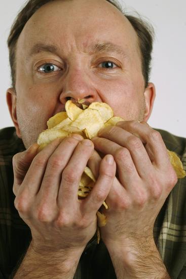 Model Released Man Binging On Crisps Editorial Stock Photo - Stock ...