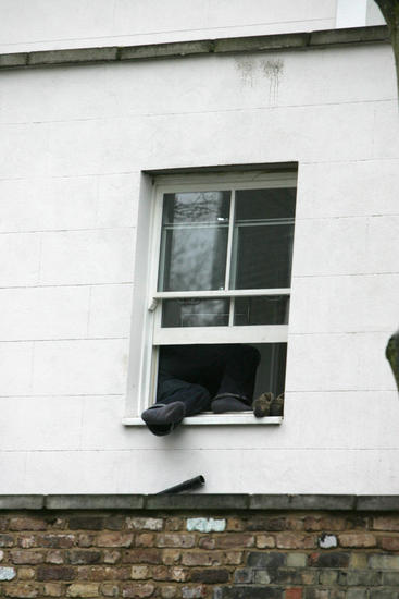 Mystery Man Climbing Through Window New Editorial Stock Photo - Stock ...