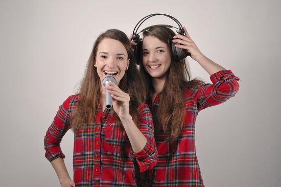 Model Released Twin Sisters One Singing Editorial Stock Photo - Stock ...
