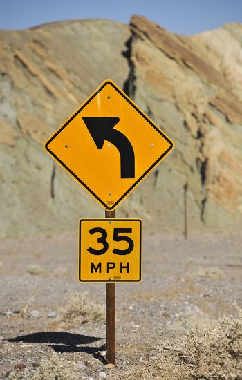 Traffic Sign Curve Ahead 35 Mph Editorial Stock Photo - Stock Image ...