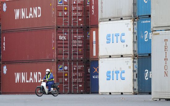 Japanese Dock Worker Rides Past Shipping Editorial Stock Photo - Stock ...