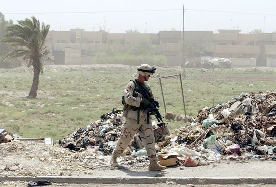American Soldier Looks Through Trash Possible Editorial Stock Photo ...