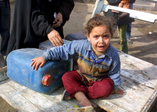 Iraqi Child Weeps While Her Mother Editorial Stock Photo - Stock Image ...